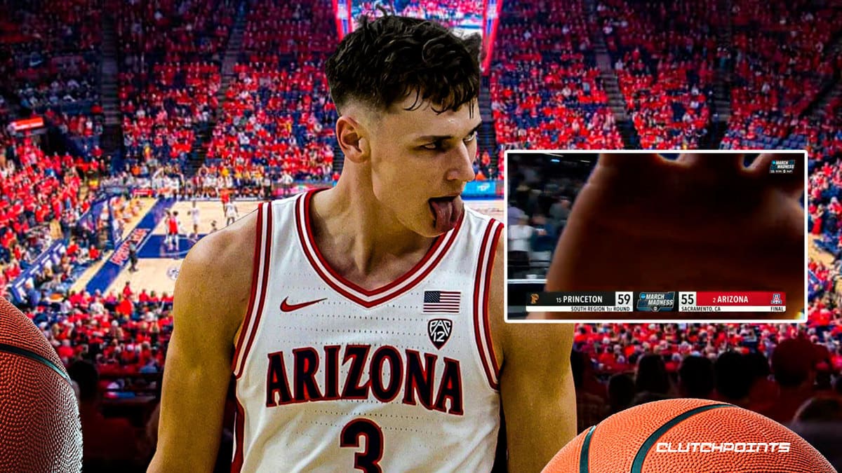 Arizona's Pelle Larsson blocks camera after upset loss to Princeton