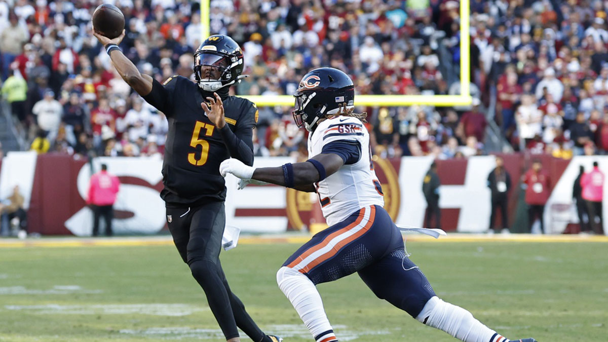 Magic Johnson in awe of Jayden Daniels' Hail Mary TD in Commanders-Bears