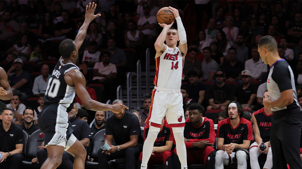 Heat's Tyler Herro hilariously distracted during interview by fight in ...