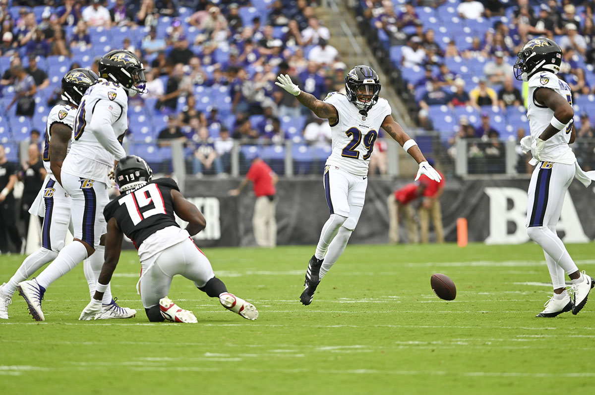 Ravens' Ar'Darius Washington sends coach flying in hilarious celebration gone wrong