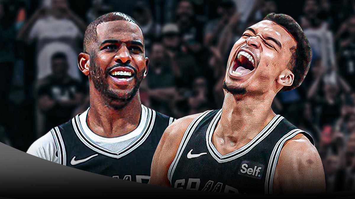 Spurs' Chris Paul gives Victor Wembanyama his flowers after defeating Pacers