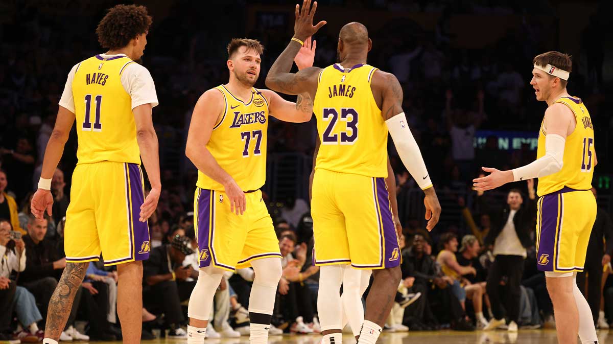 Lakers' LeBron James hugs a crying Luka Doncic after tribute video