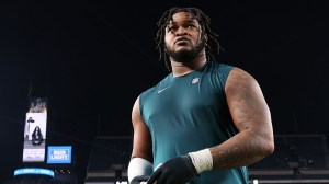 Eagles' Jalen Hurts lights up victory cigar after advancing to Super Bowl